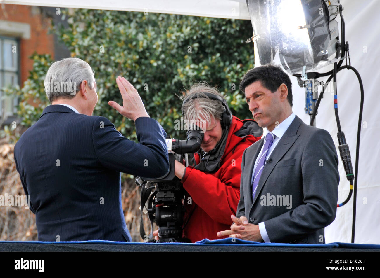 Close up camera operator films BBC presenter Jon John Jonathan Sopel ...
