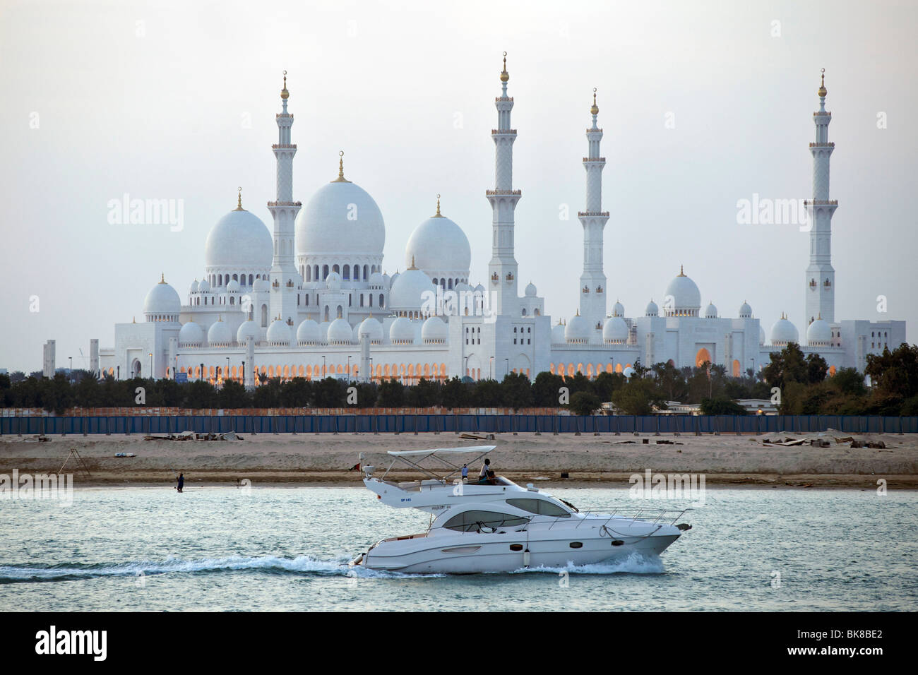 A luxury motor boat cruising past the Sheikh Zayed Grand Mosque in Abu ...