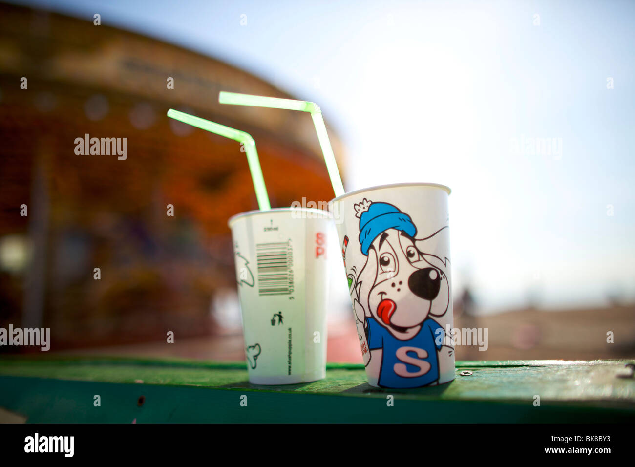 Slush puppy cups and straws abandoned near the merry-go-round on ...