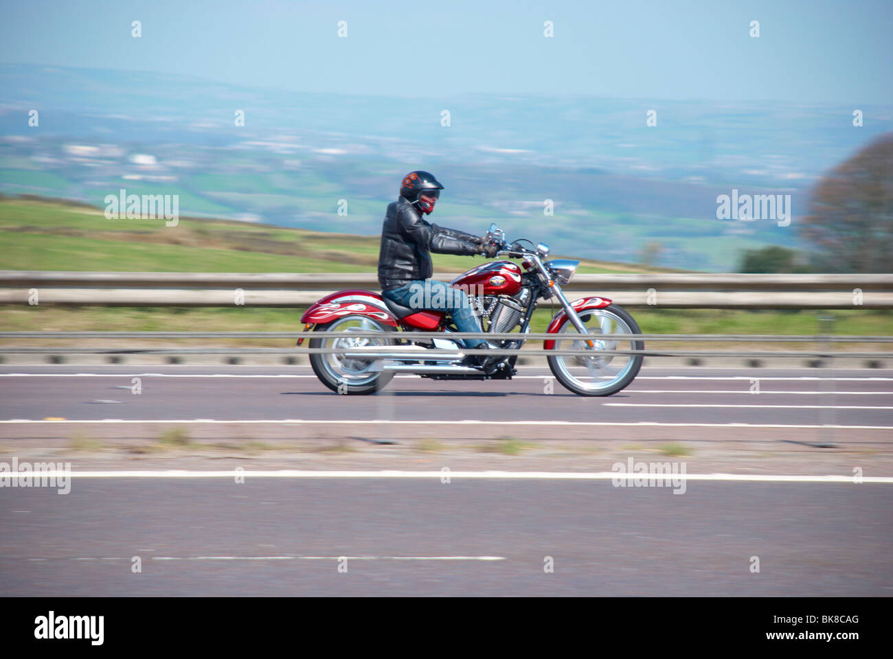 Biker on the M62 motorway (near Outlane, Huddersfield Stock Photo - Alamy