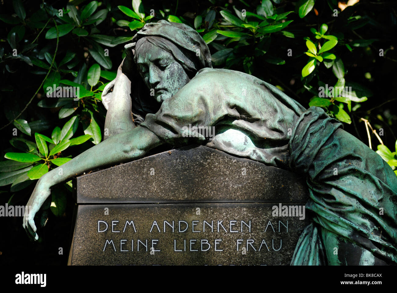 Historic statue of a grieving woman at the Ohlsdorf cemetery in Hamburg ...