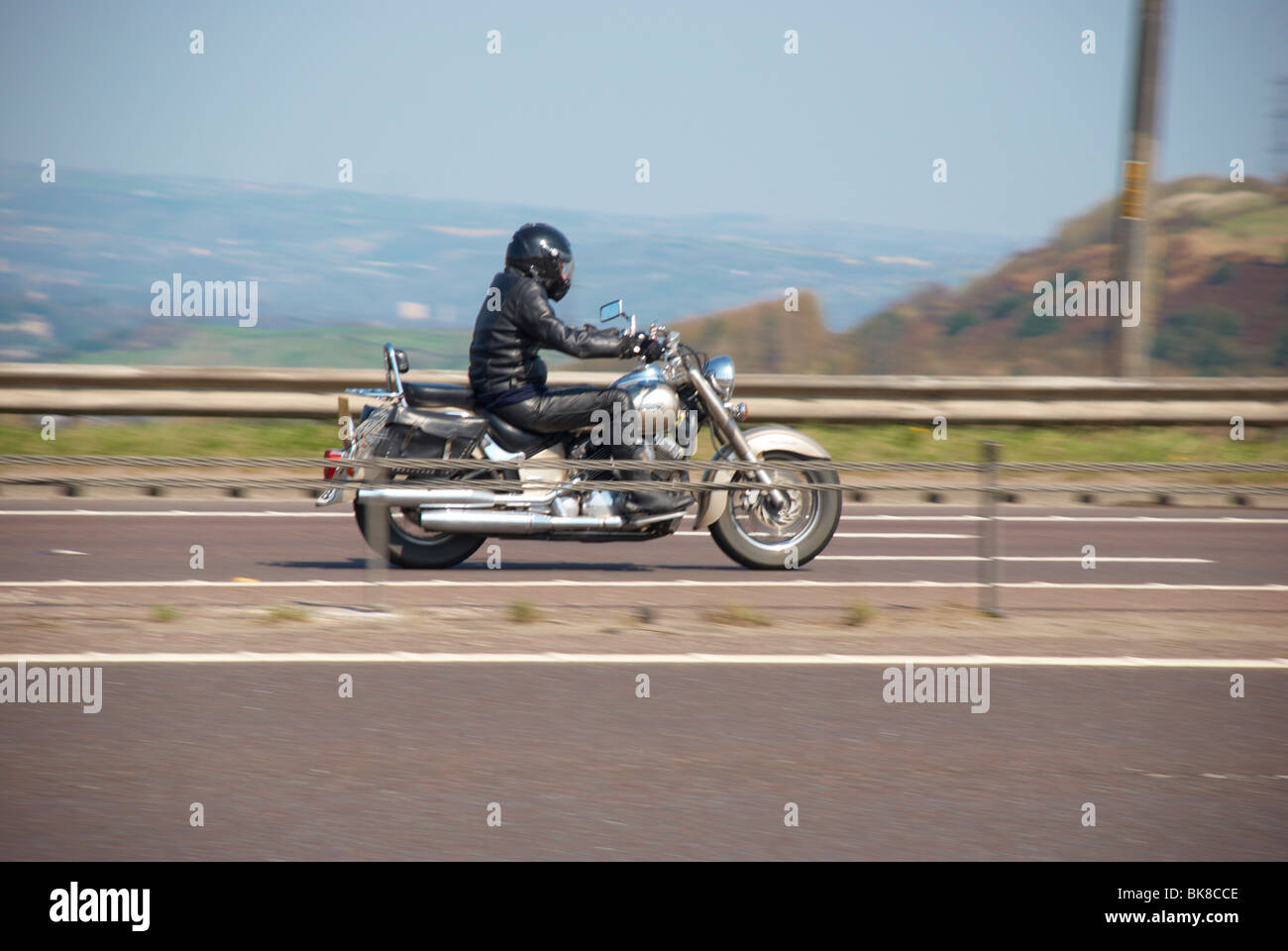 Biker on the M62 motorway (near Outlane, Huddersfield Stock Photo - Alamy