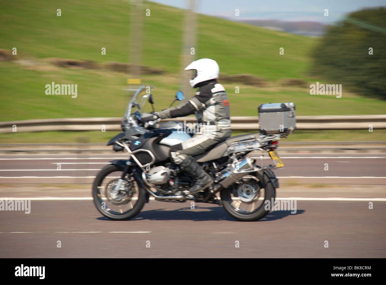 Biker on the M62 motorway (near Outlane, Huddersfield Stock Photo - Alamy