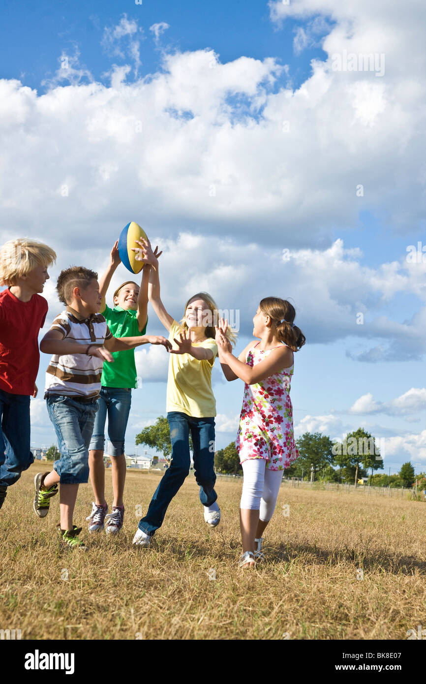 Group of children playing outdoor hi-res stock photography and images ...