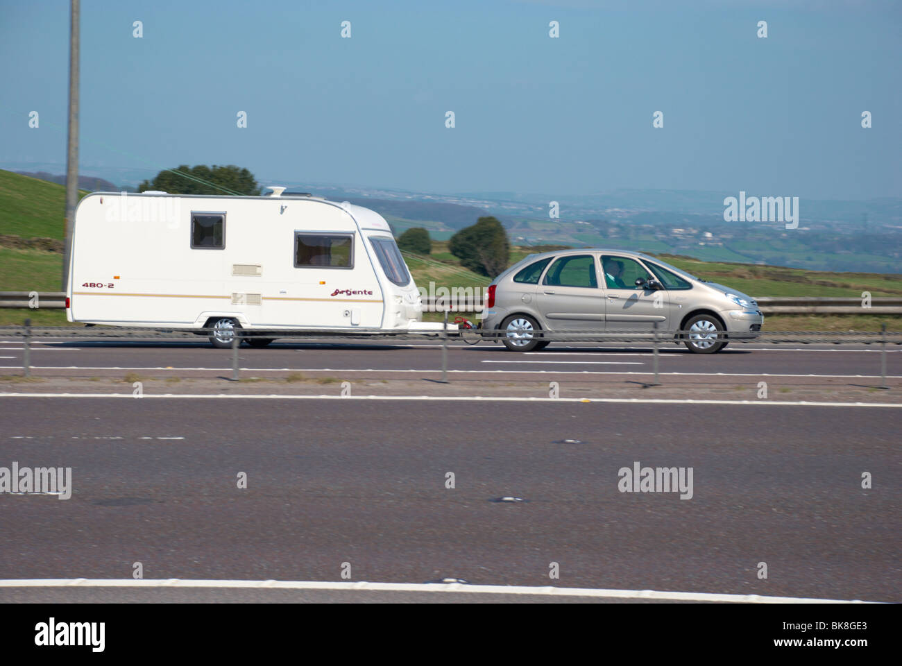 Car & caravan on the M62 (near Huddersfield Stock Photo - Alamy