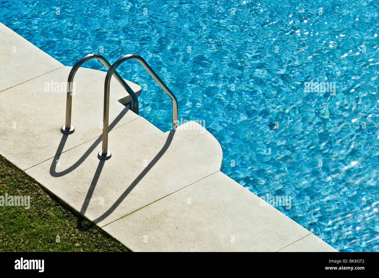 Pool side safety rails Stock Photo - Alamy