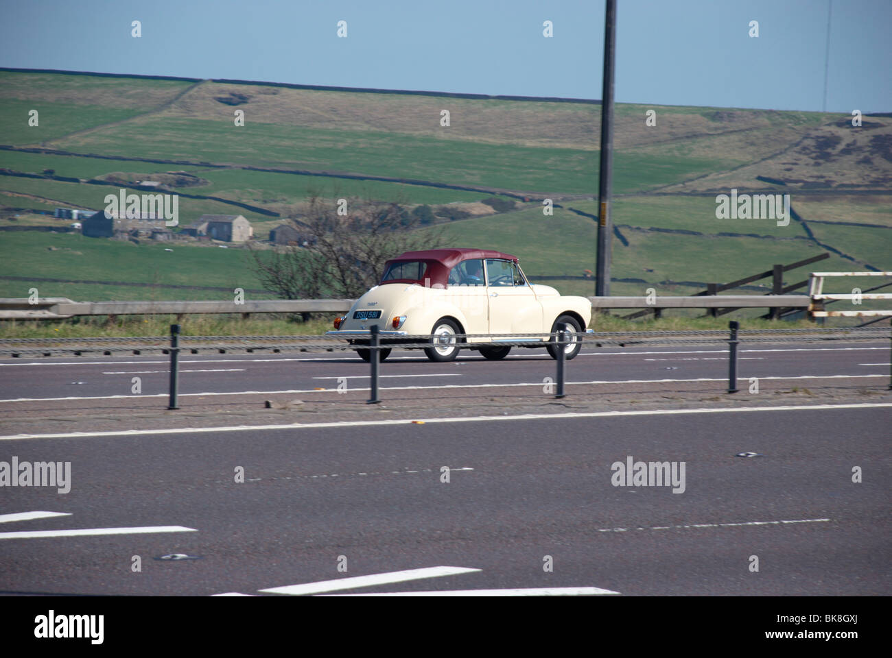 Classic car on the M62. Old morris minor Stock Photo - Alamy