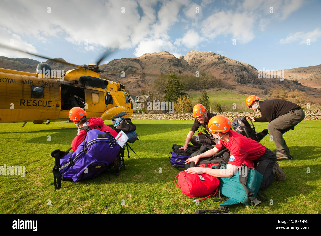 Members of Langdale/Ambleside Mountain Rescue team exit an RAF Sea King ...