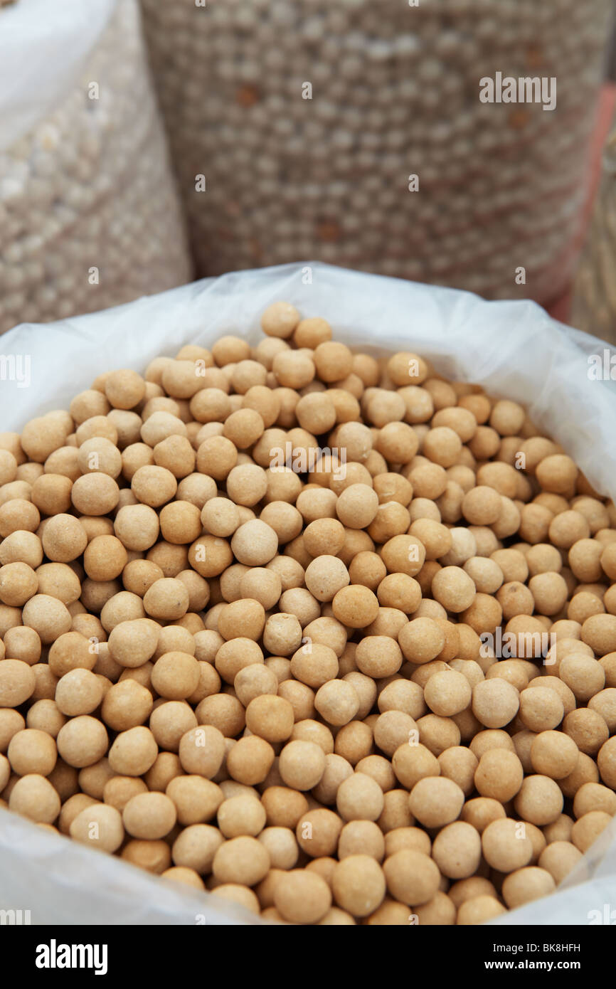 Bags of dry Soya beans from the market as a textured food background ...