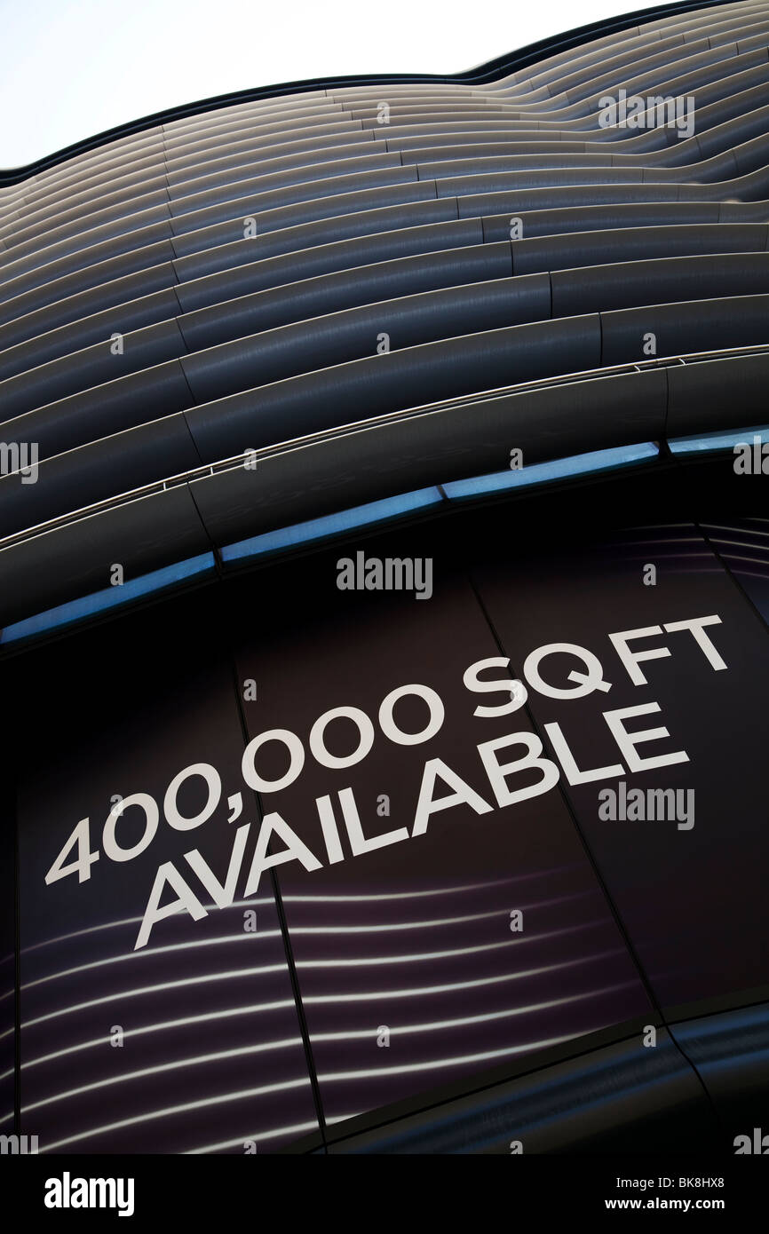 Offices to let sign hanging on side of large office block, London, UK ...