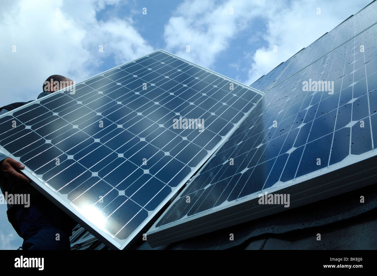 polycrystalline silicon photo-voltaic solar panel during mounting ...