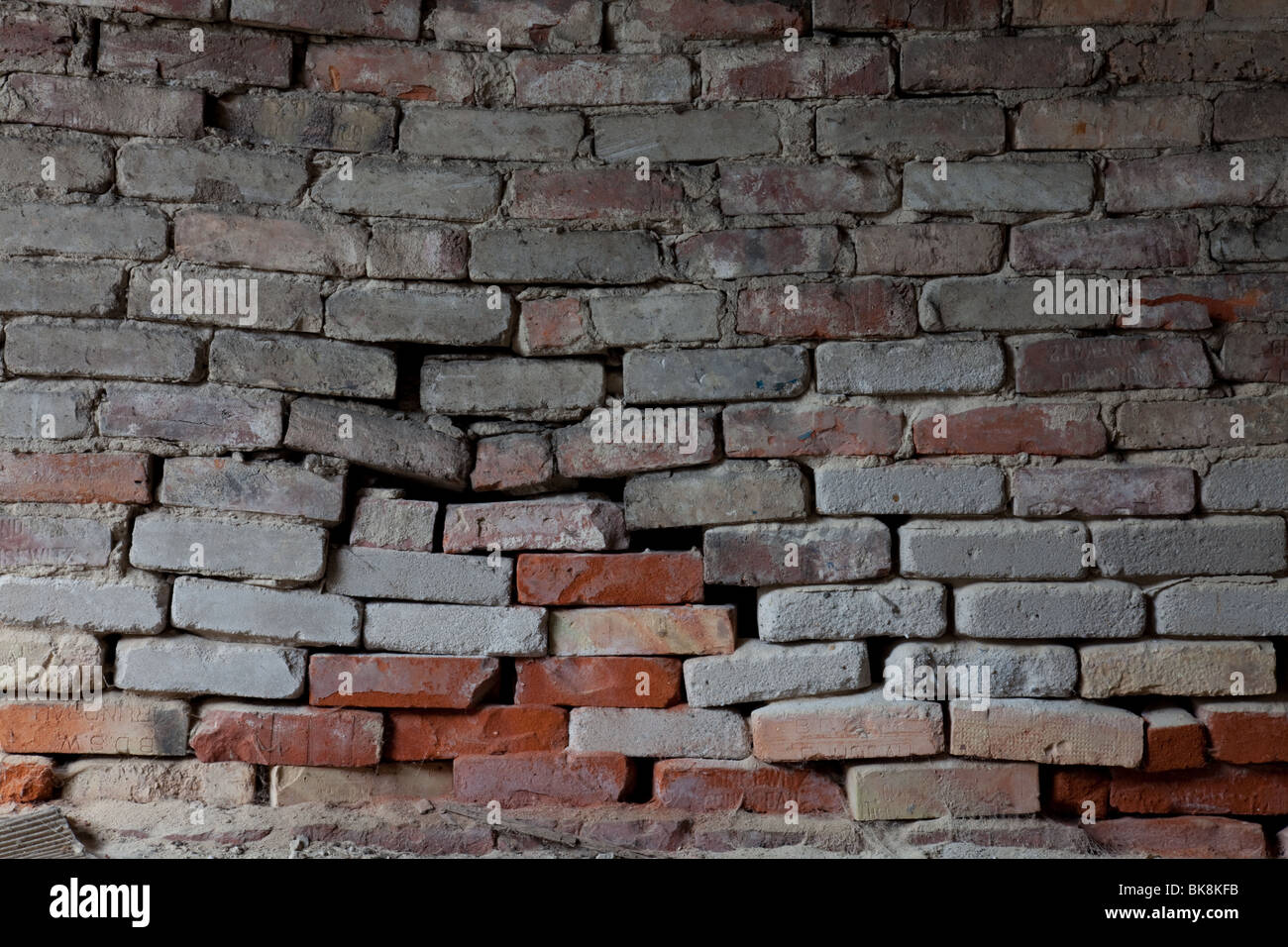 Close-up of a damaged brick wall in an old abandoned factory Stock ...