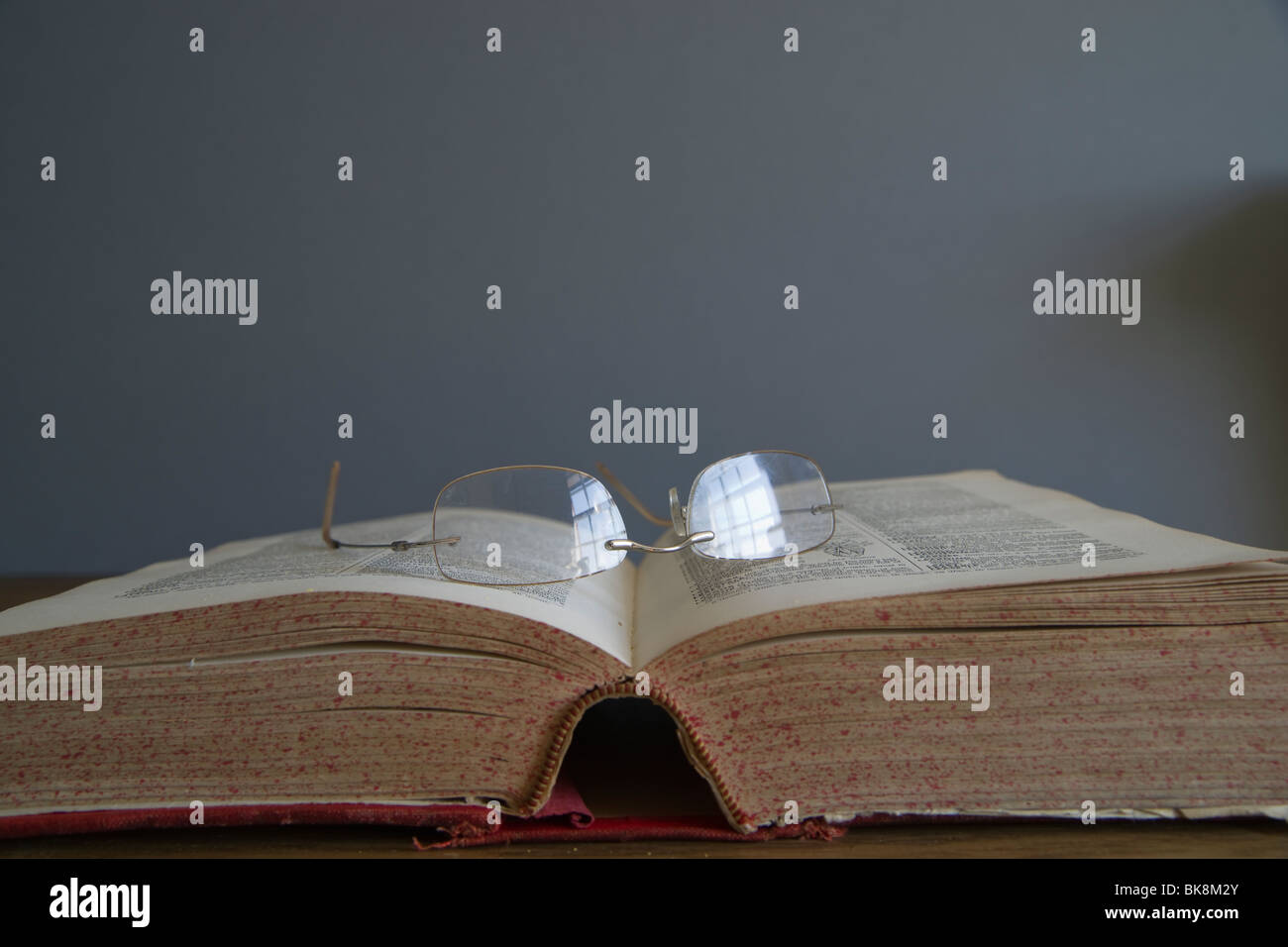 Book and Glasses Stock Photo - Alamy
