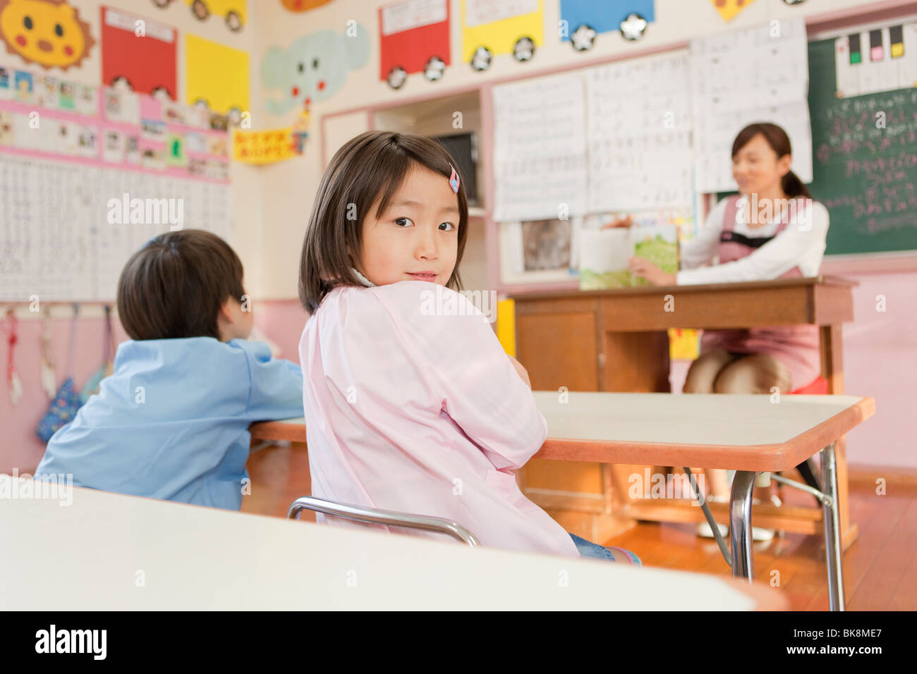 Kindergarten Girl Looking Back Stock Photo - Alamy