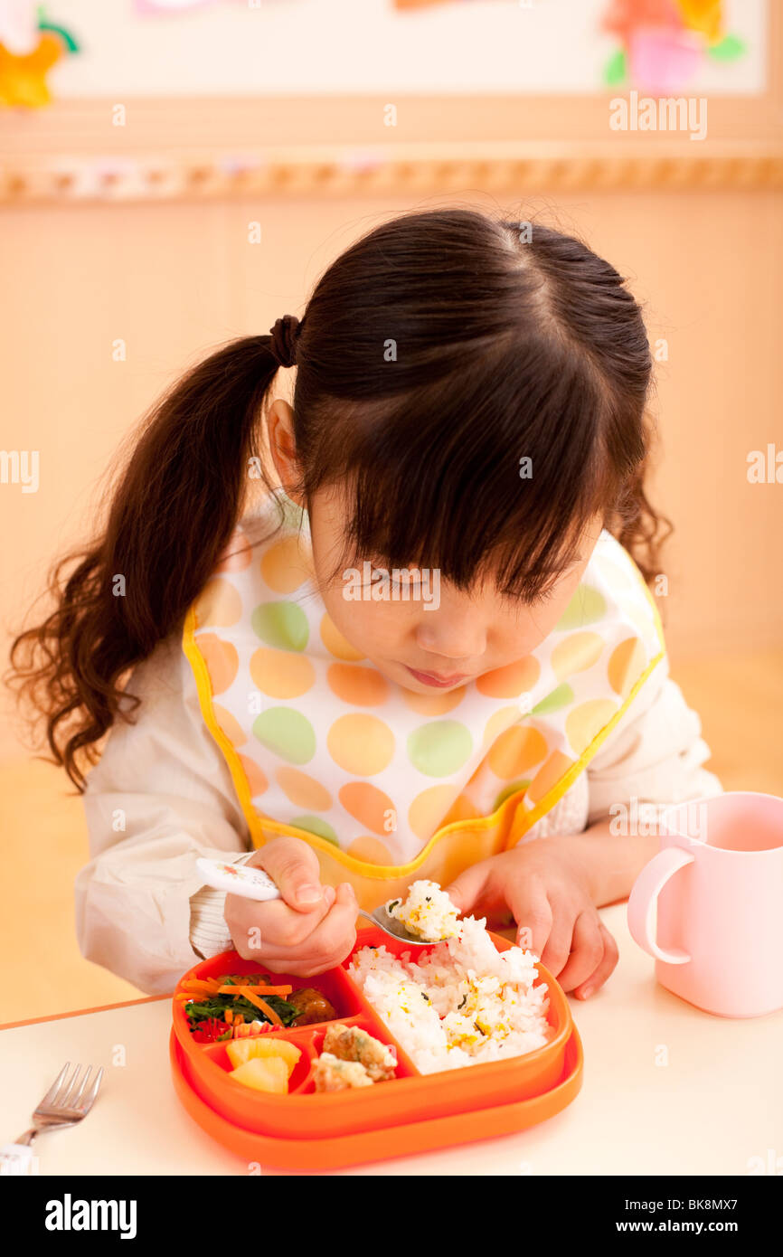 Girl Eating School Lunch Stock Photo - Alamy