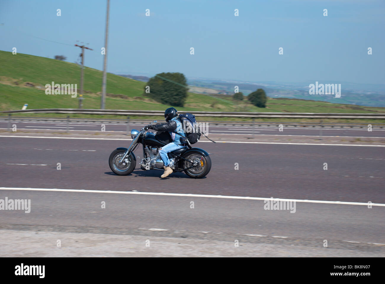 Biker on the M62 motorway (near Outlane, Huddersfield Stock Photo - Alamy