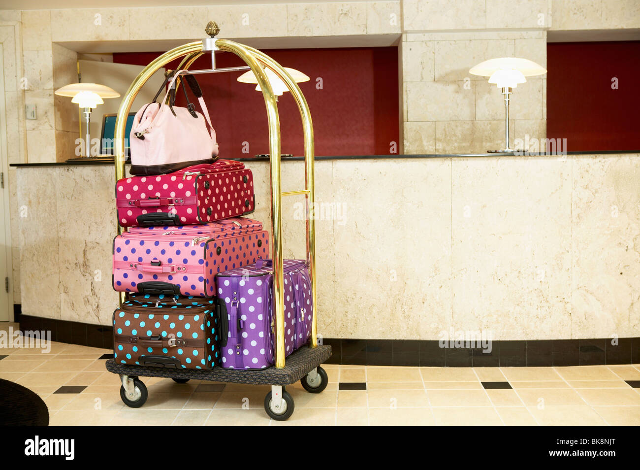 Luggage cart at the checkout counter Stock Photo - Alamy