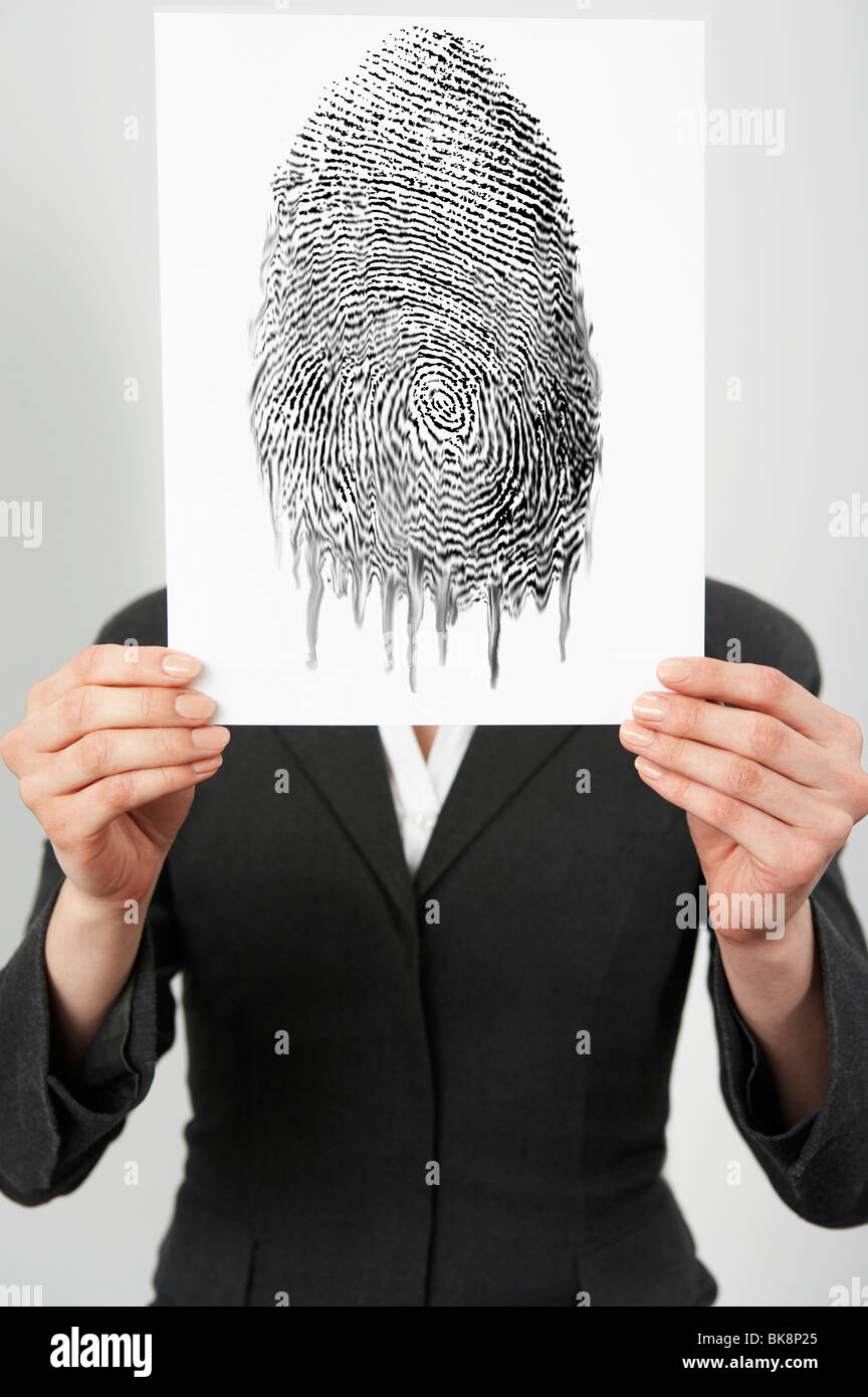 Businesswoman holding a fingerprint photo Stock Photo - Alamy