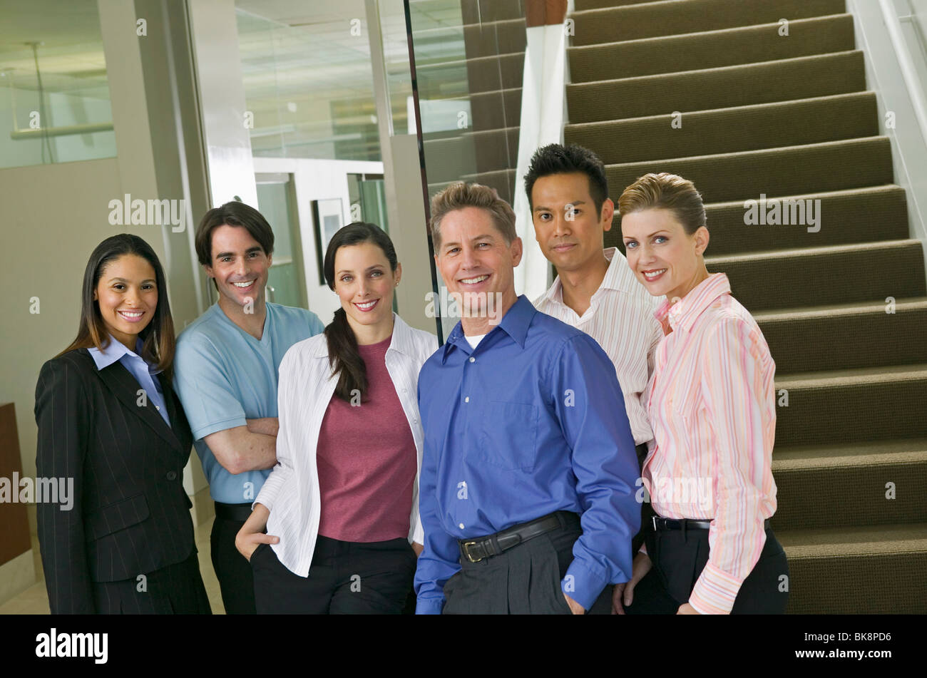 Business executives standing together Stock Photo - Alamy