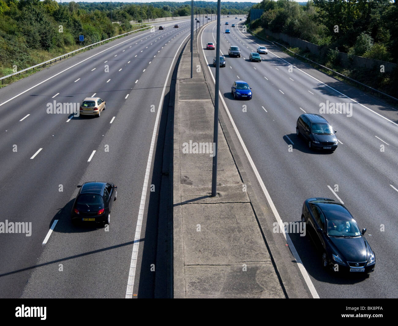 View from a footbridge looking down on traffic travelling / passing on ...