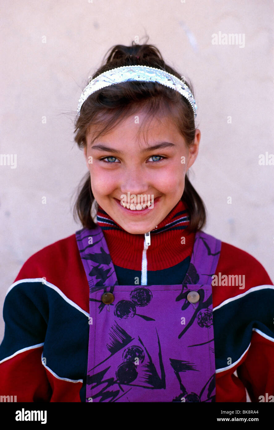Portrait of a young smiling girl in the former Soviet Union town of ...