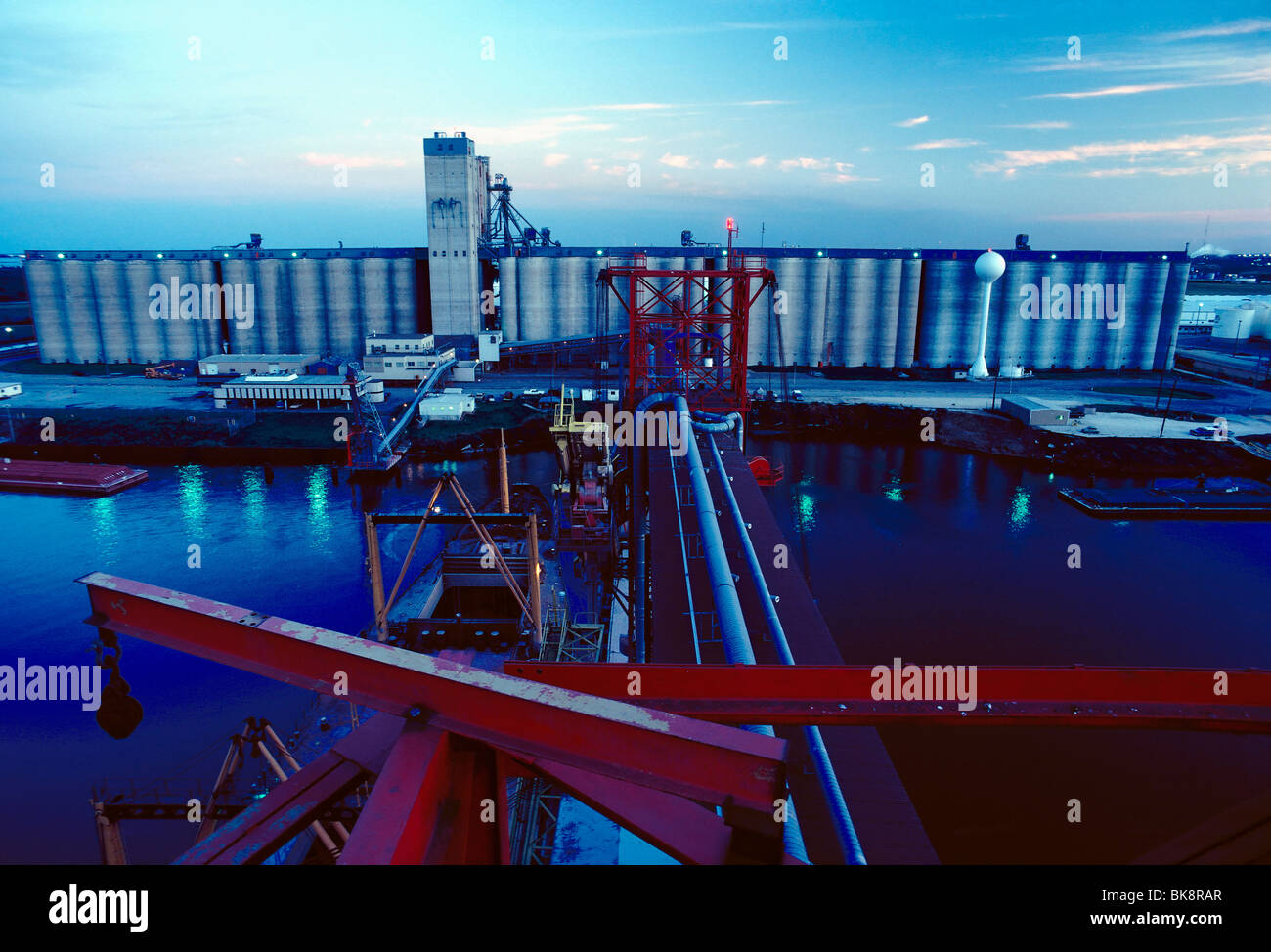 Loading grain from silos into a container ship for export, Houston Ship ...