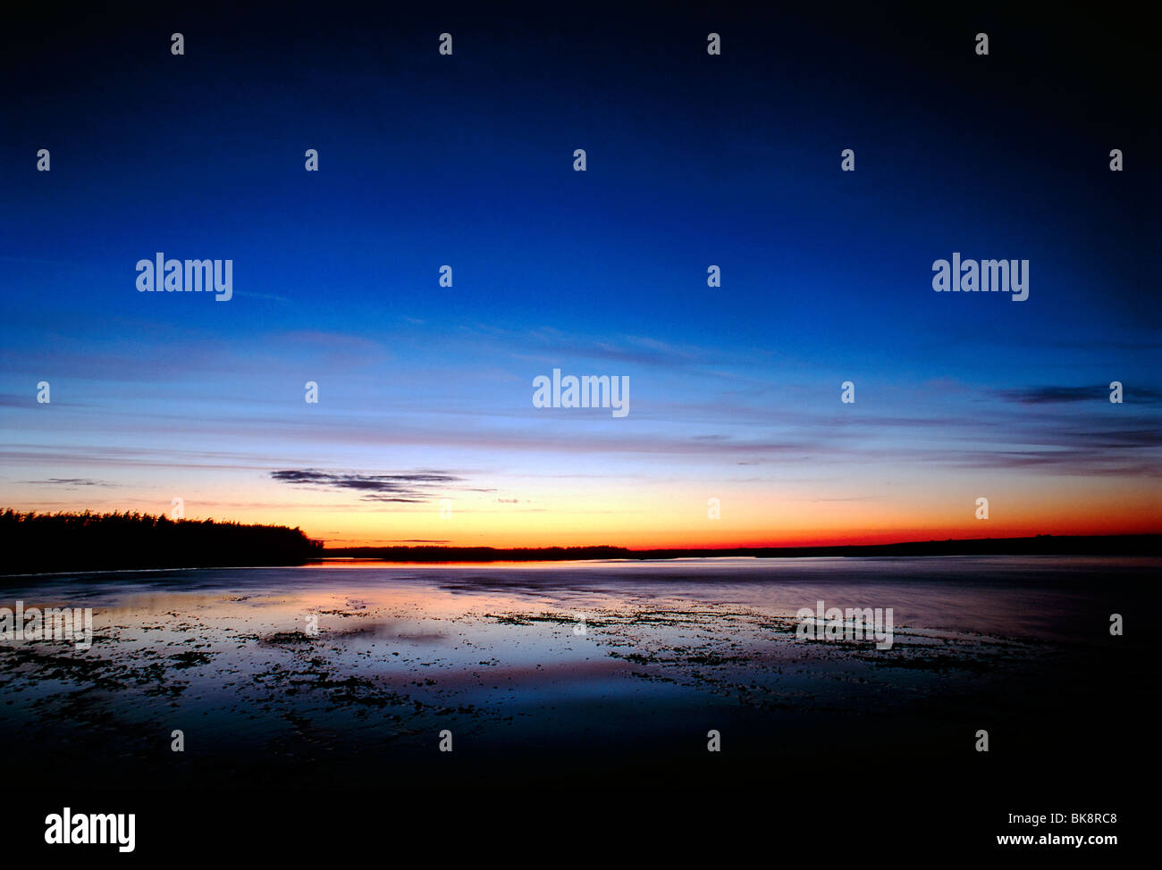11PM summer sunset over the Belaya River, Magadon Region, Siberia ...