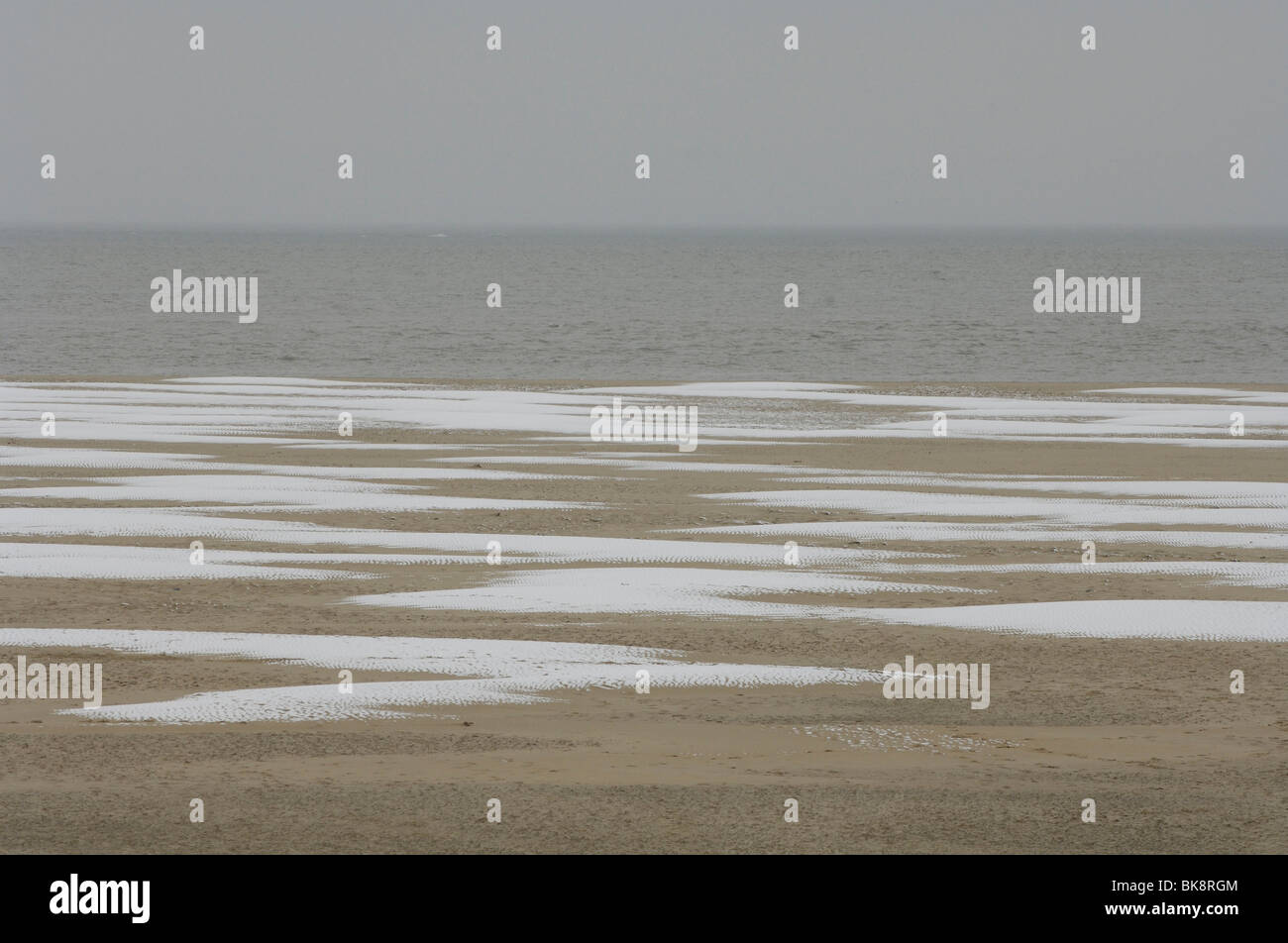 Snow on beach Stock Photo - Alamy