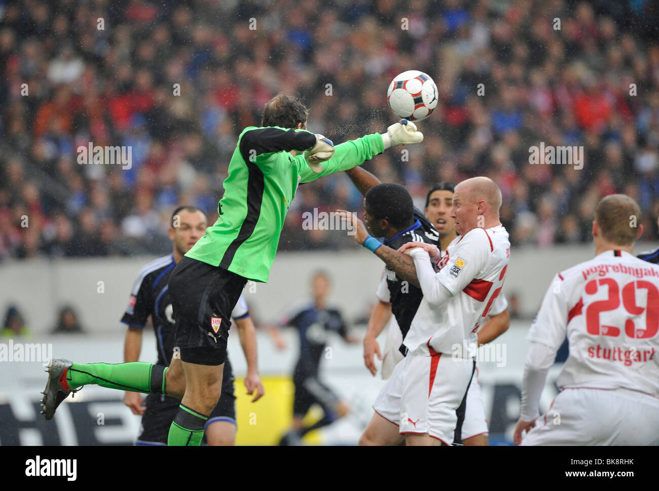 Goalkeeper Jens Lehmann, VfB Stuttgart, punching a ball away from ...
