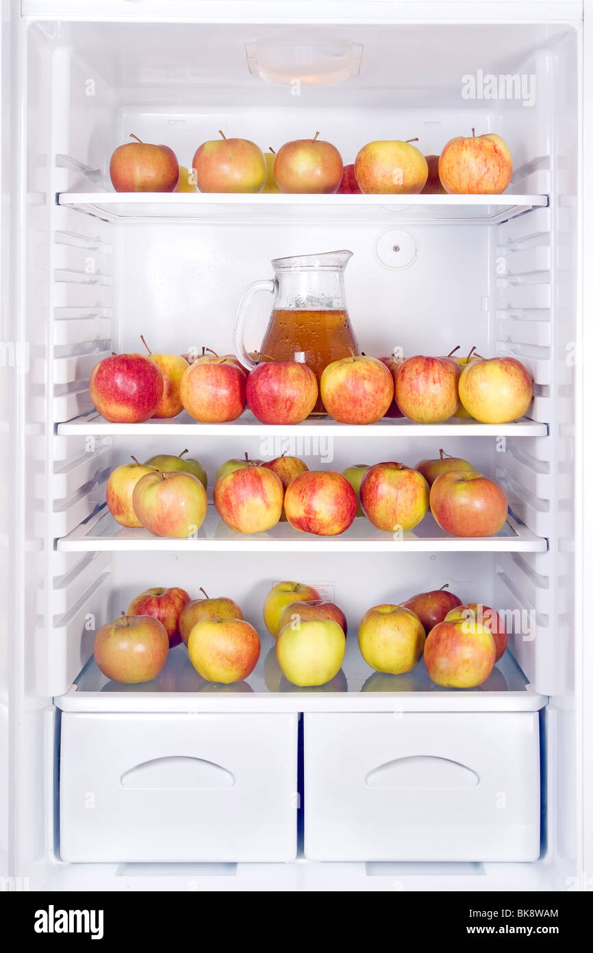 apples with jug in the refrigerator Stock Photo - Alamy