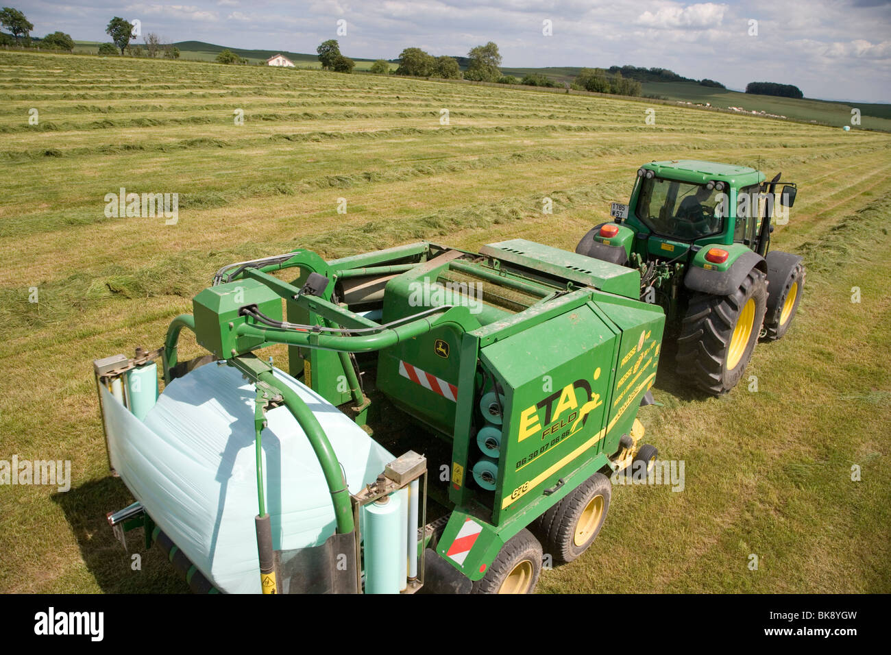 Pressing hay hi-res stock photography and images - Alamy