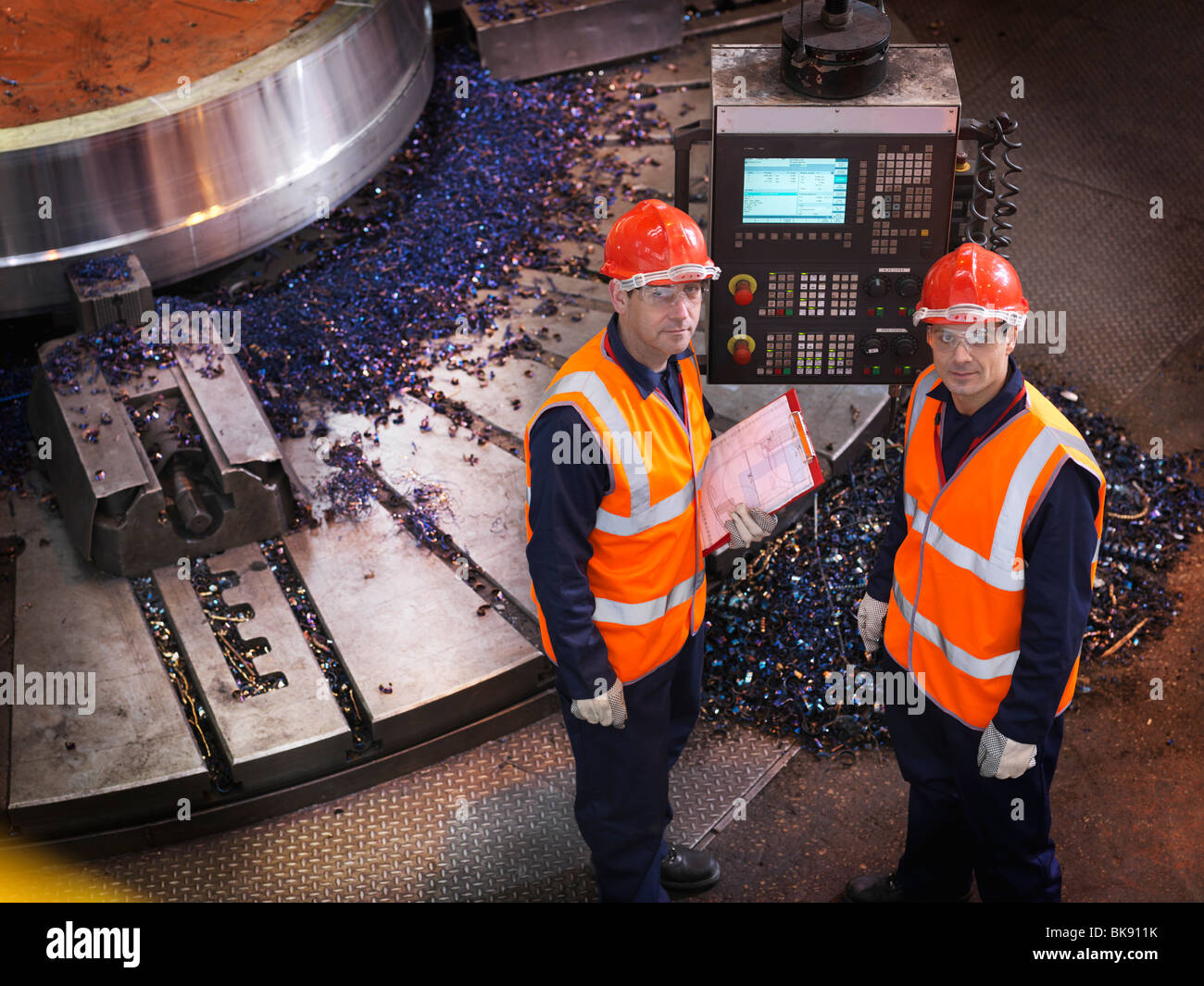 Steel Engineers With Lathe Stock Photo - Alamy