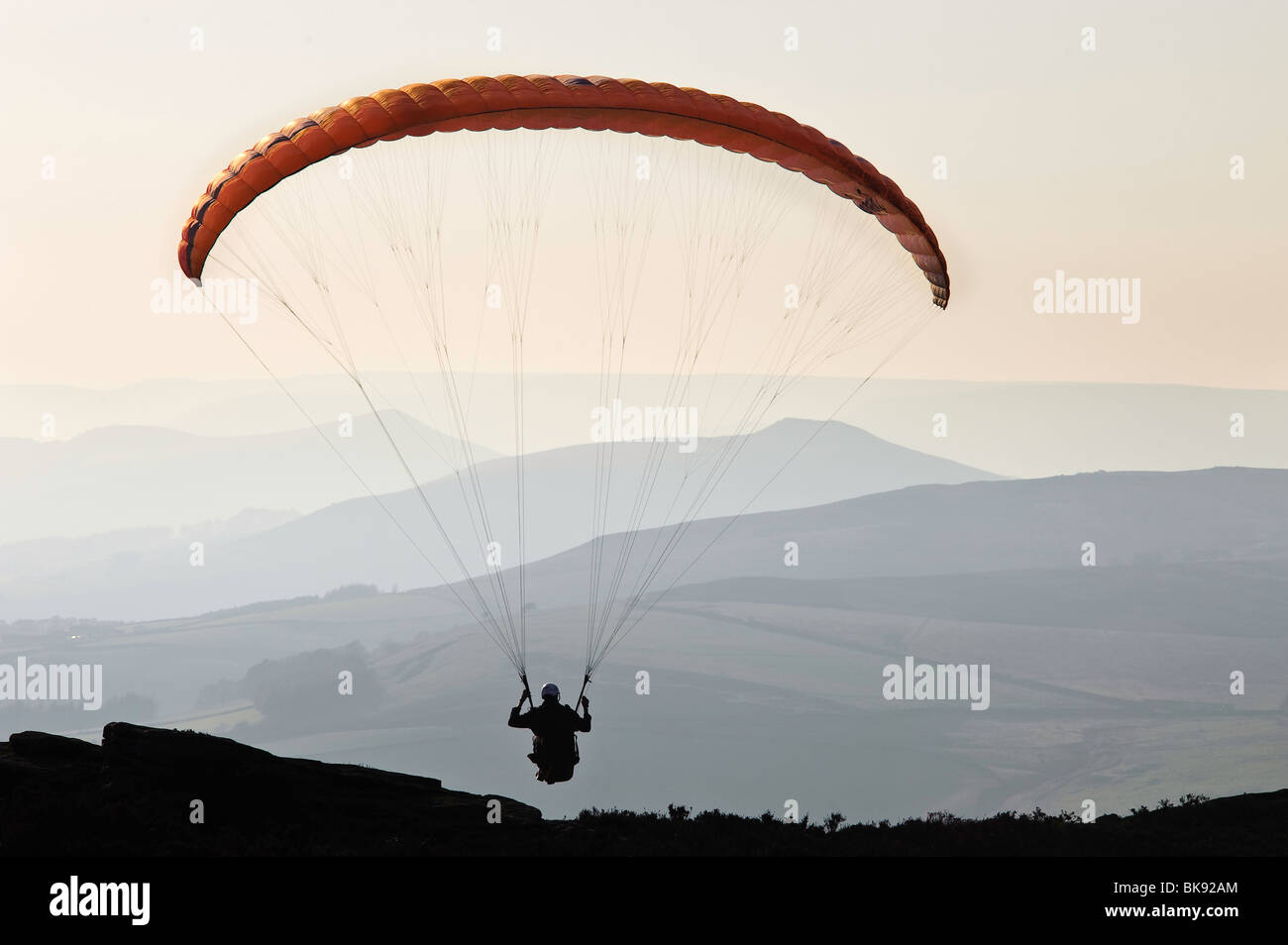 Paraglider with red canopy hi-res stock photography and images - Alamy