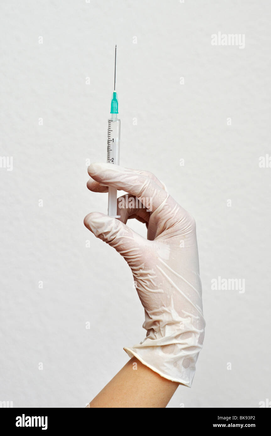 Woman hand glove holding hi-res stock photography and images - Alamy