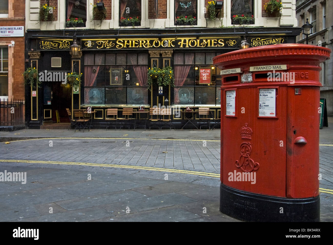 The Sherlock Holmes Pub, with Post Box, London Stock Photo - Alamy