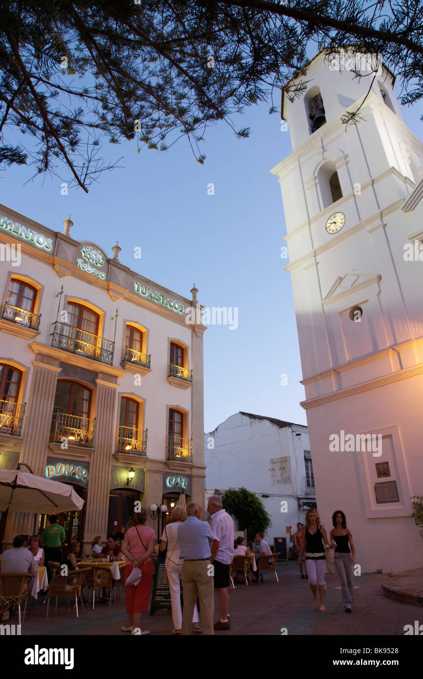 Hotel and bar at main square, church Iglesia El Salvador, Nerja ...