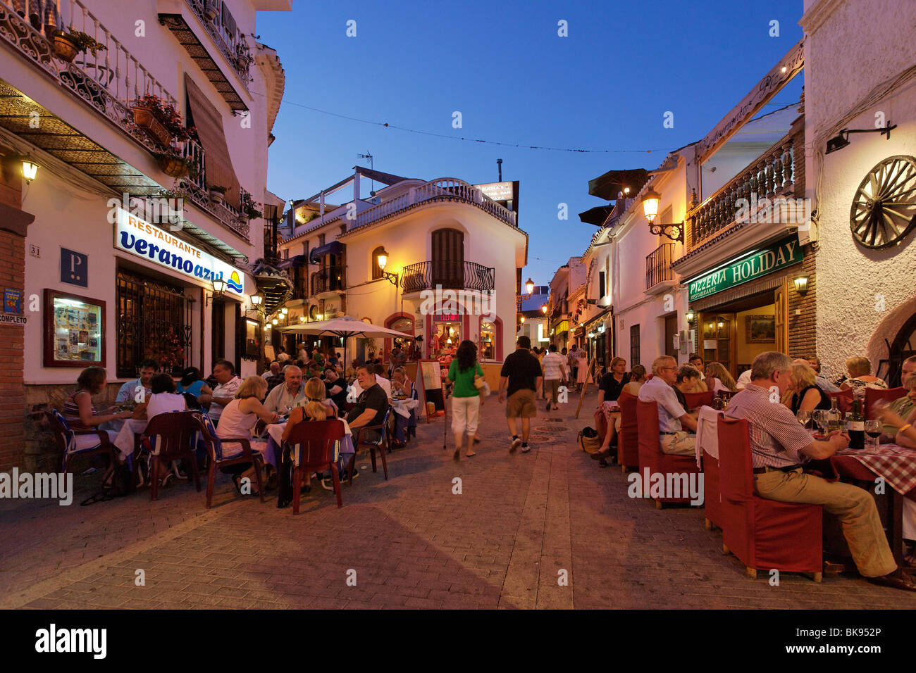 Guests in restaurants in Old Town in the evening, Nerja, Andalusia ...