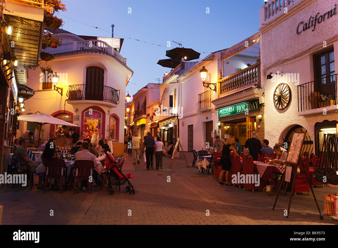 Guests in restaurants in Old Town in the evening, Nerja, Andalusia ...