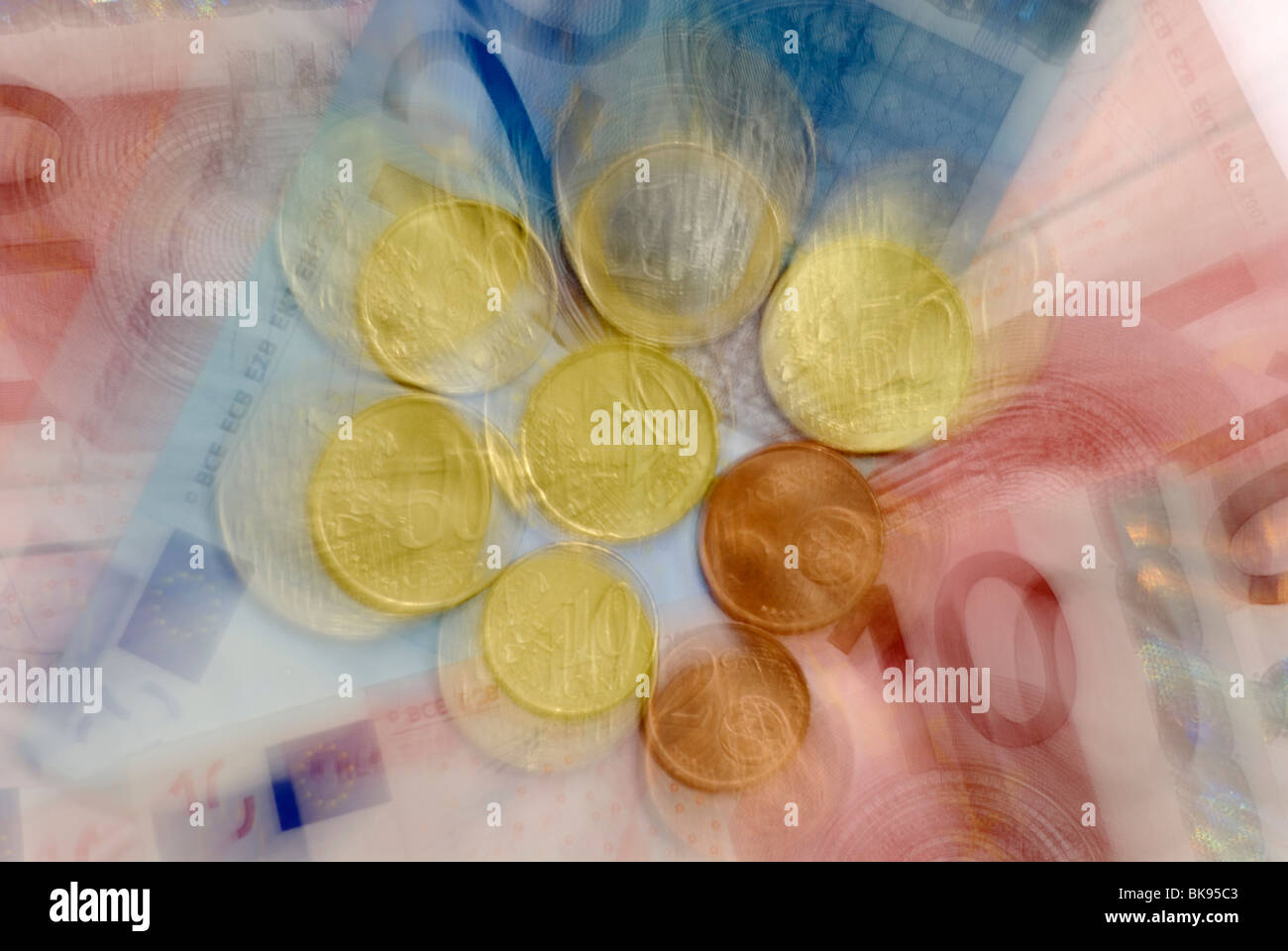 Money, euro notes and coins, zoom effect Stock Photo - Alamy