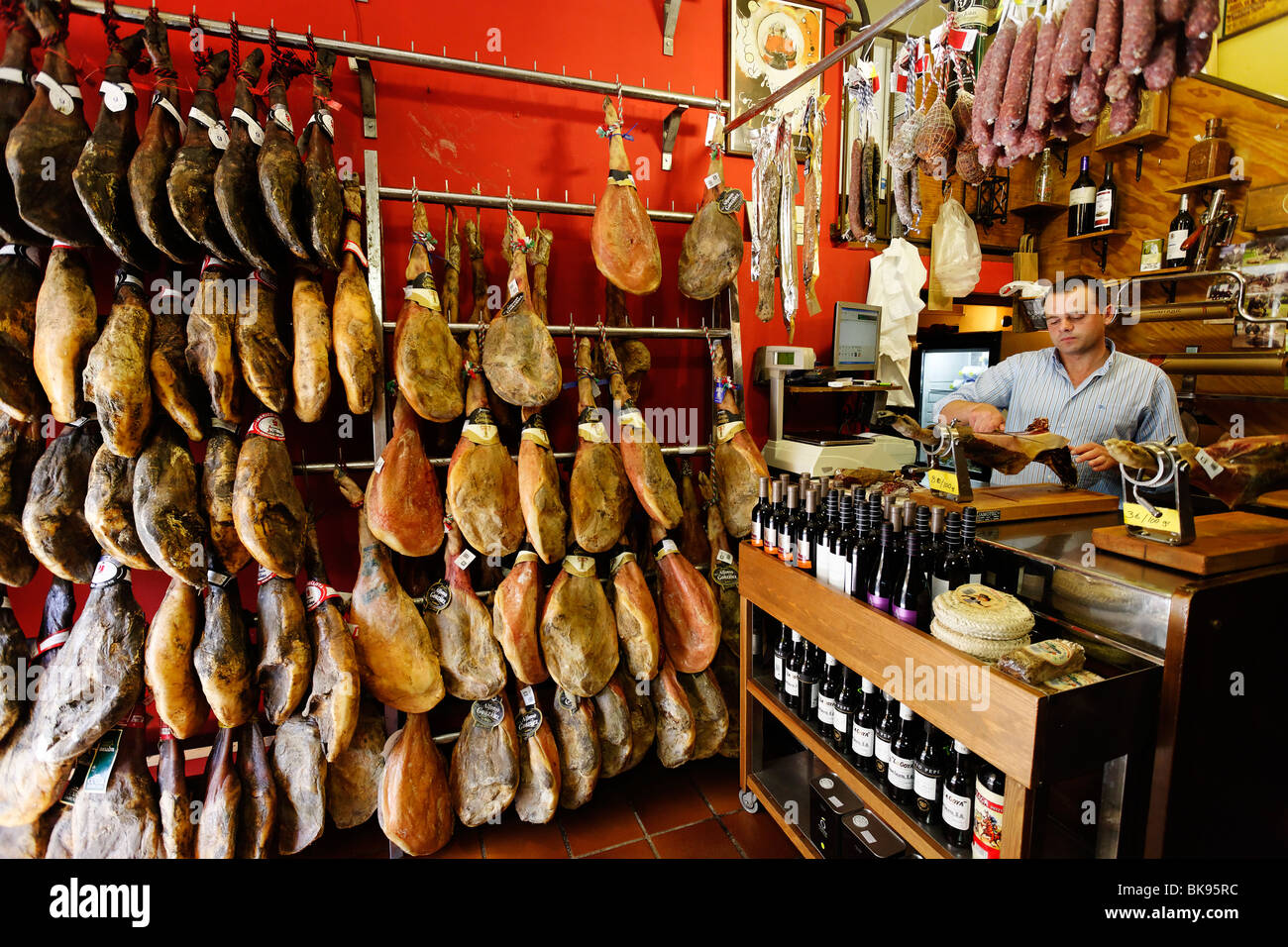 Seller inside a butchery, Ronda, Andalusia, Spain Stock Photo - Alamy