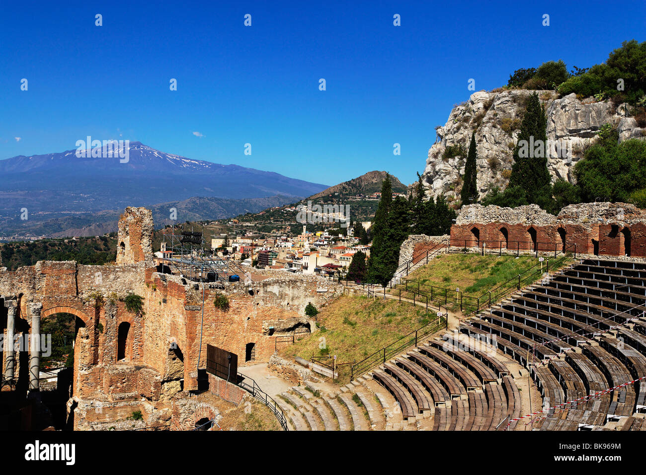 Ancient theater with mount Etna in background, Taormina, Sicily, Italy ...