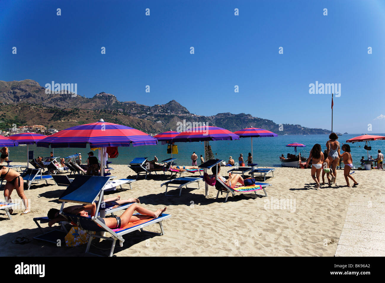 Italian woman sunbathing on beach hi-res stock photography and images ...