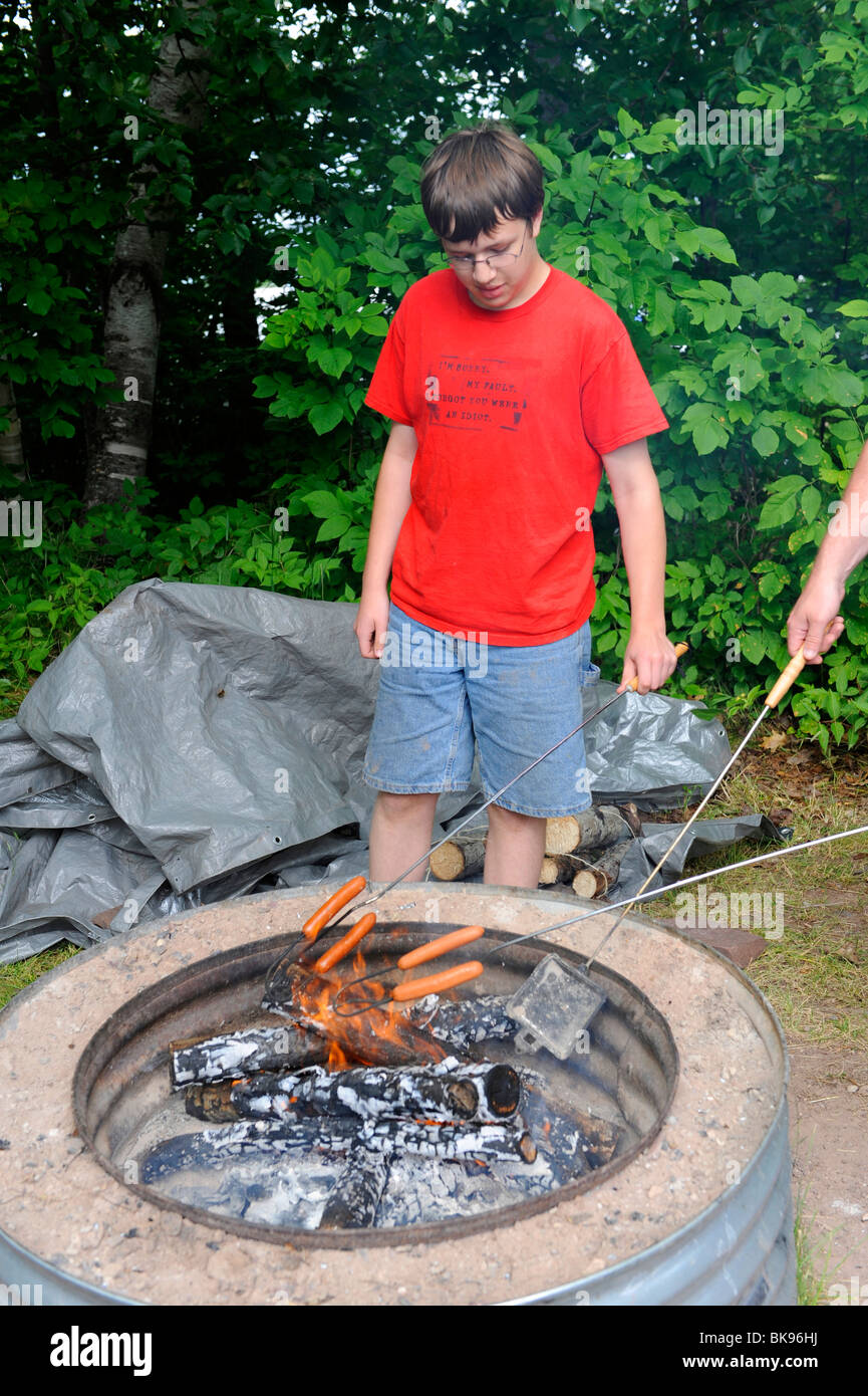 Family Camping and cooking food at Porcupine Mountains Wilderness State ...