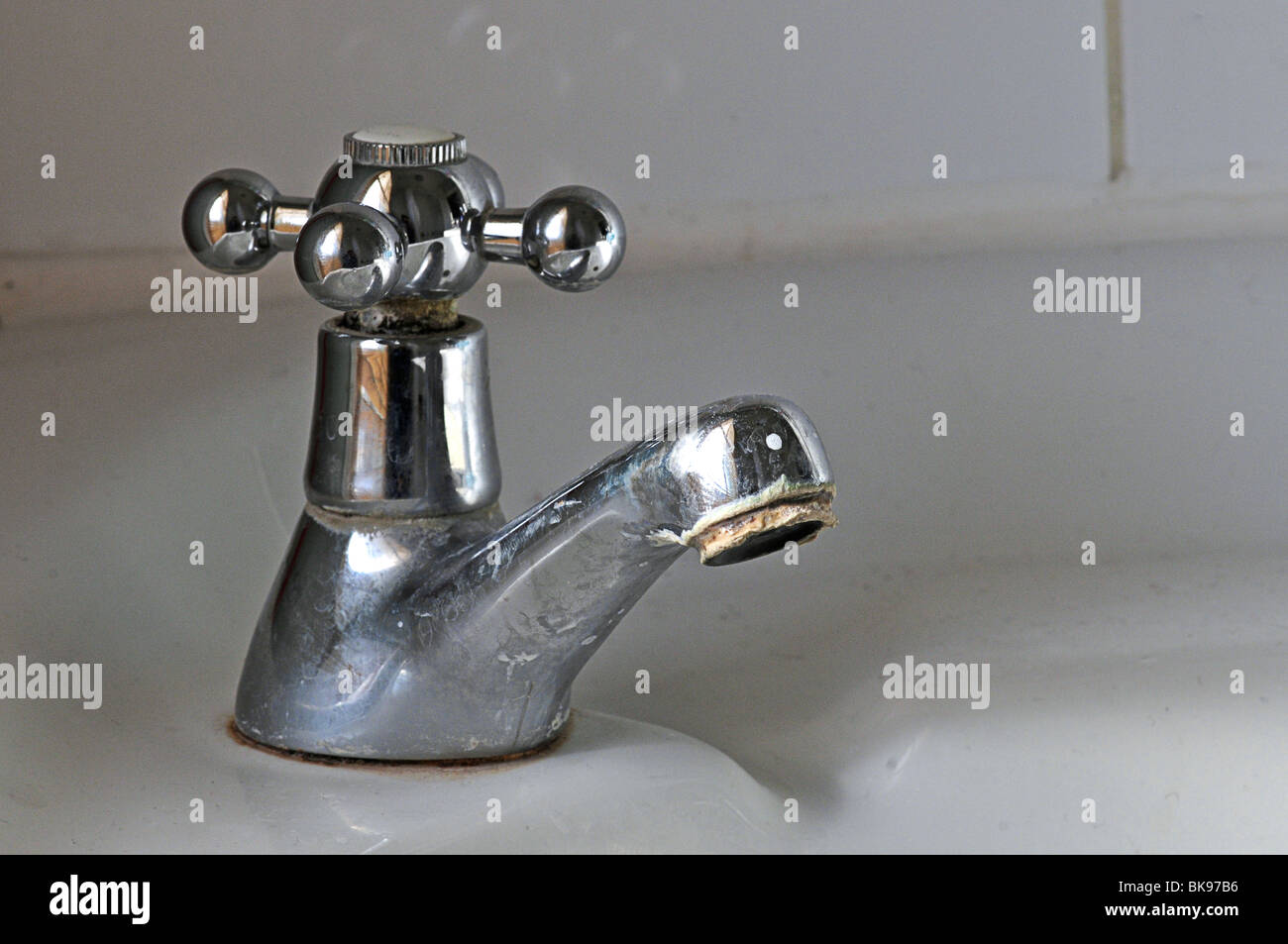 The right tap of a bathroom sink Stock Photo - Alamy