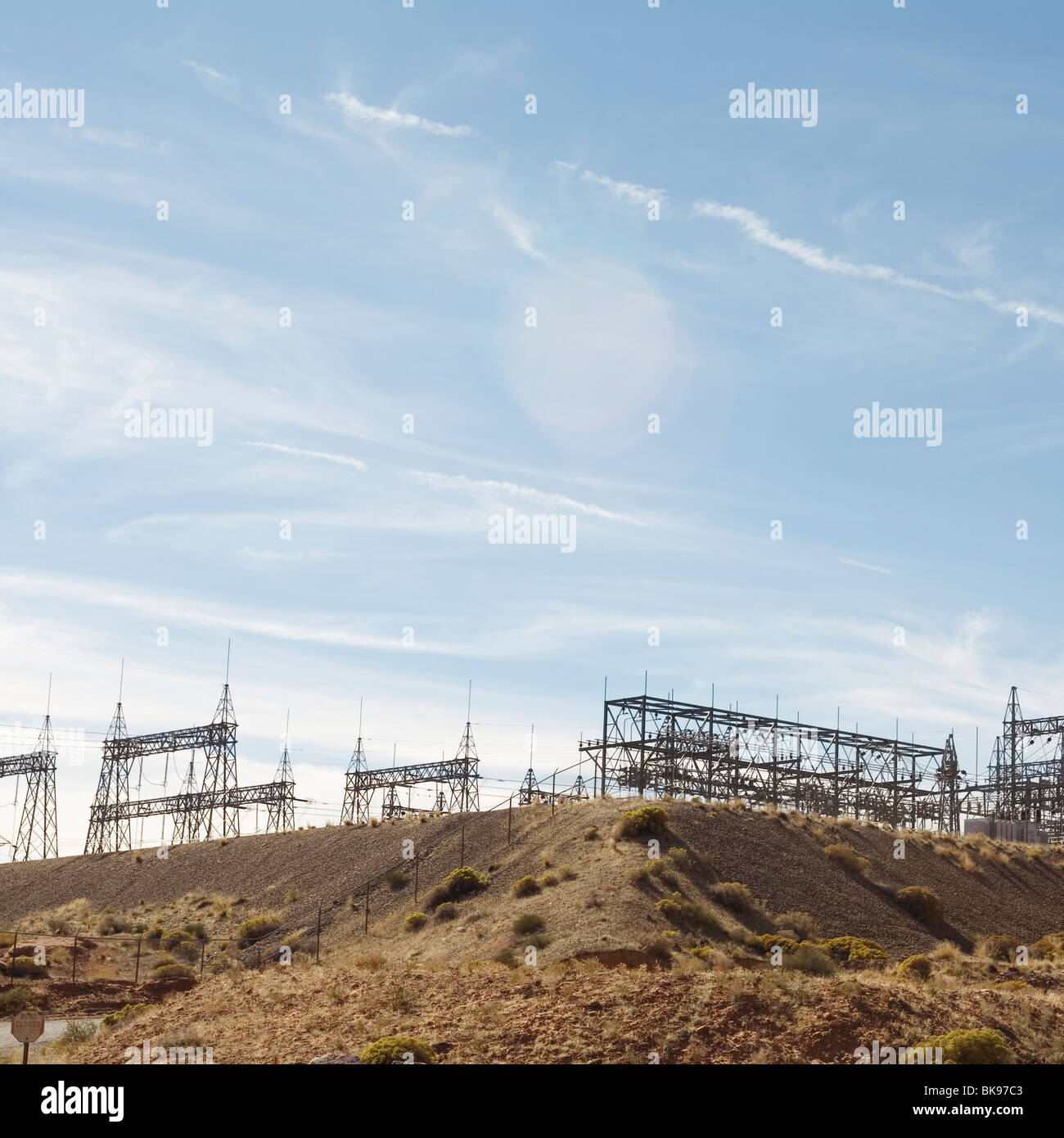 Electrical power rods on field Stock Photo - Alamy