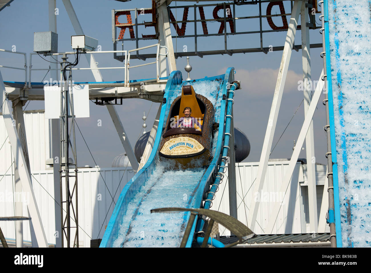 Young girl on the water chute ride on Brighton Pier UK Stock Photo - Alamy