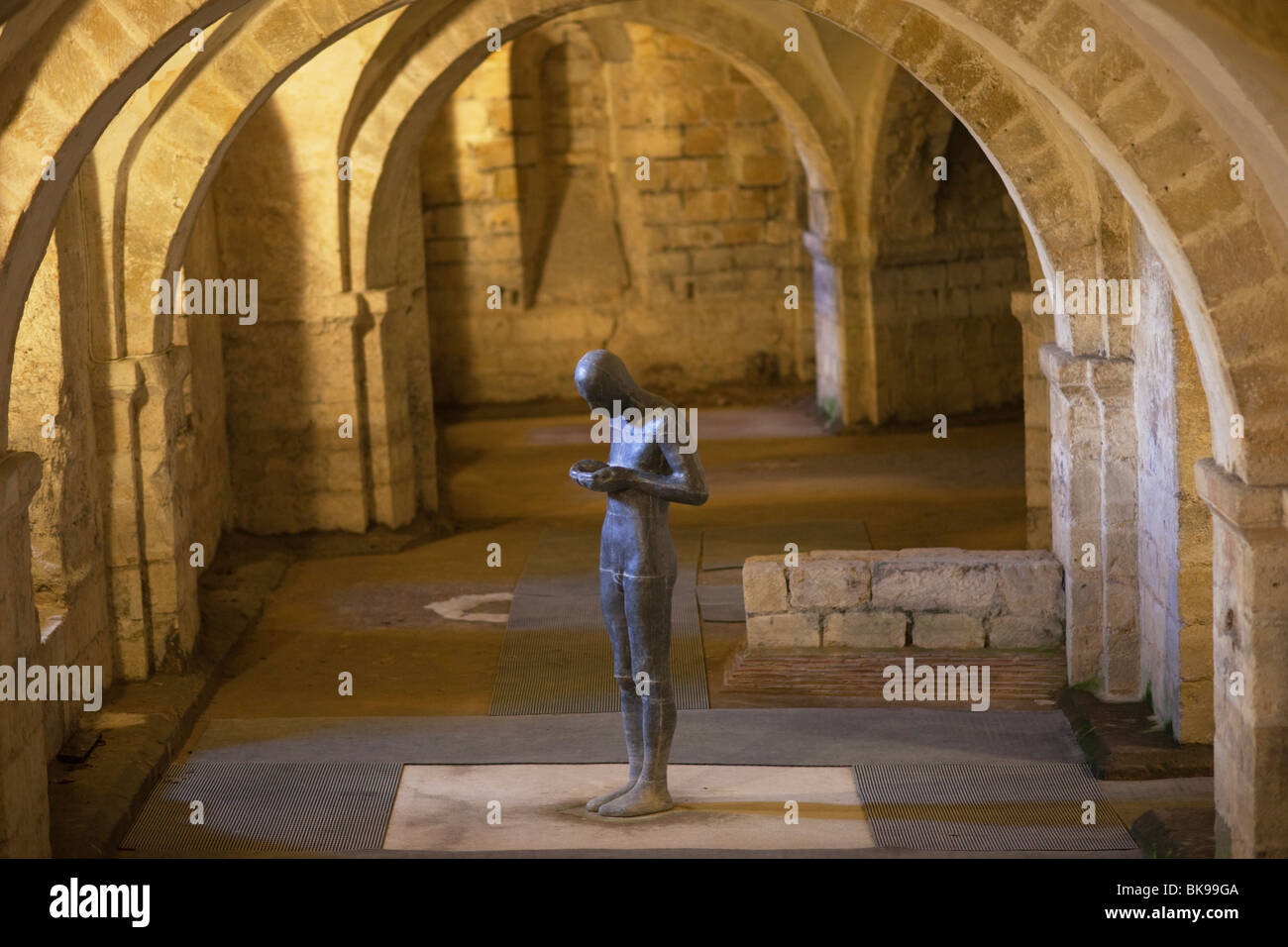 Sound II statue in the crypt of a cathedral, Winchester Cathedral ...