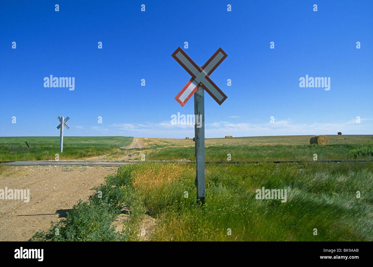 A lonely railroad crossing in the Great Plains of Saskatchewan, Canada ...
