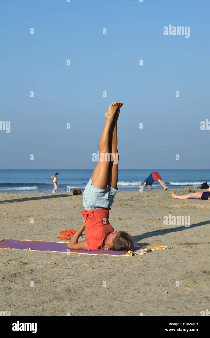 Early morning yoga practice on the beach in Varkala, Kerala, India ...