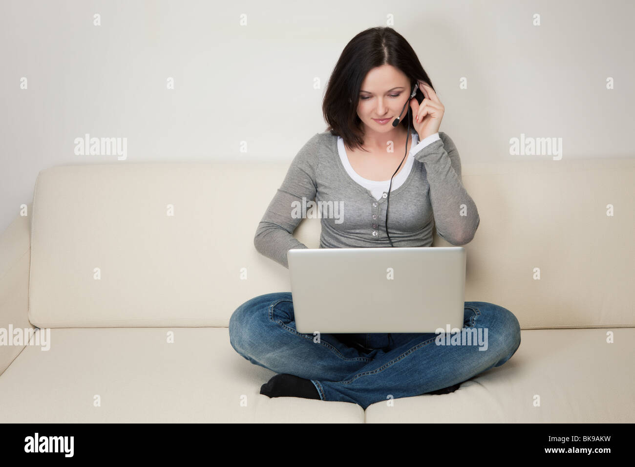 beautiful woman portrait talking on a laptop at home Stock Photo - Alamy